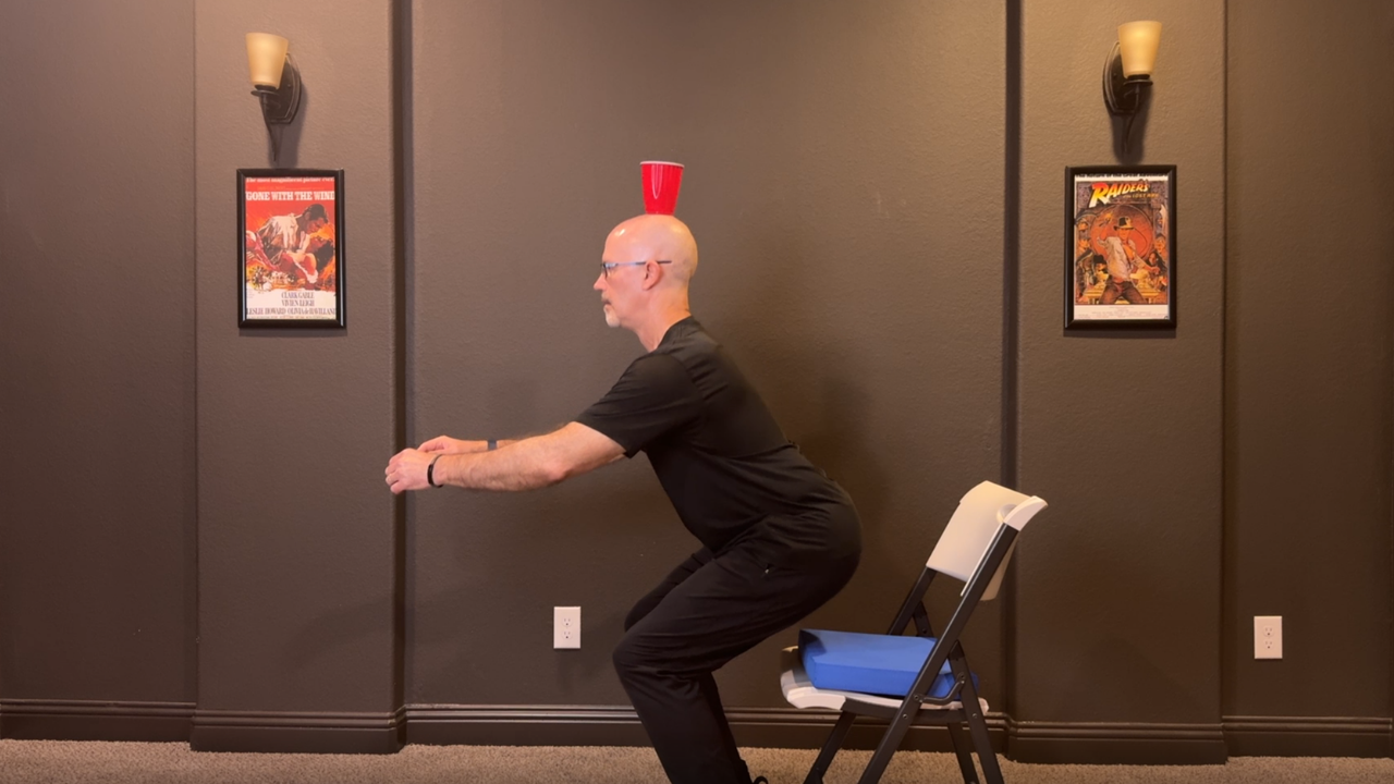 The Cup Balance Squat: A Simple Drill to Sharpen Posture and Control